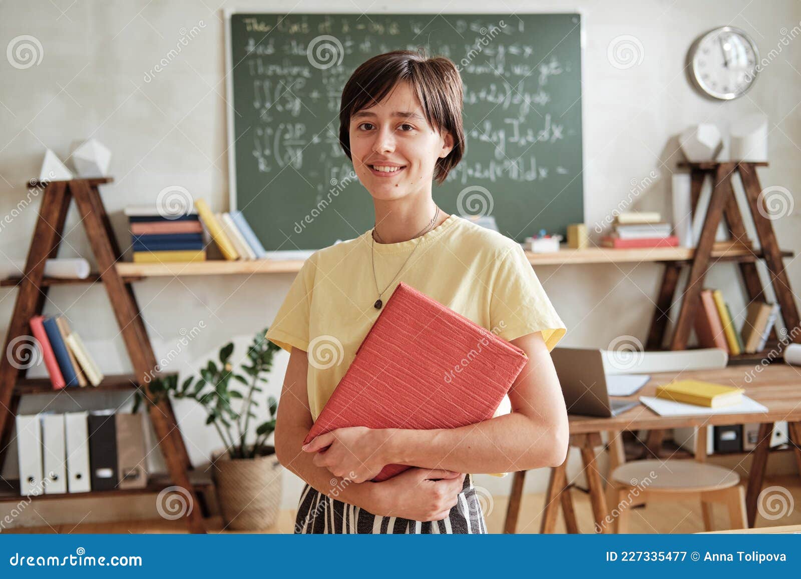 Teacher teaching at school stock image. Image of teaching - 227335477