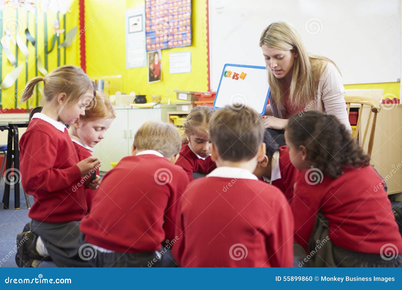 Teacher Teaching Spelling To Elementary School Pupils Stock Photo ...