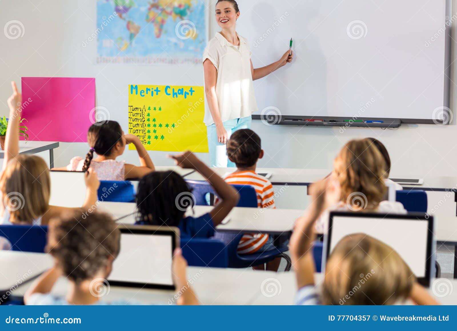 Teacher Teaching Students Using Whiteboard Stock Image - Image of ...