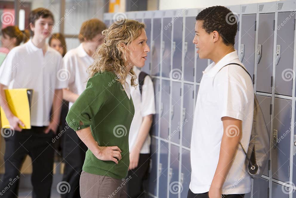 A Teacher Telling a Student Off Stock Photo - Image of secondary ...