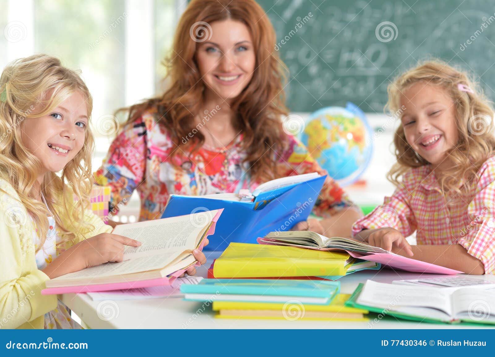 Teacher with Two Girls at Lesson Stock Photo - Image of books, class ...