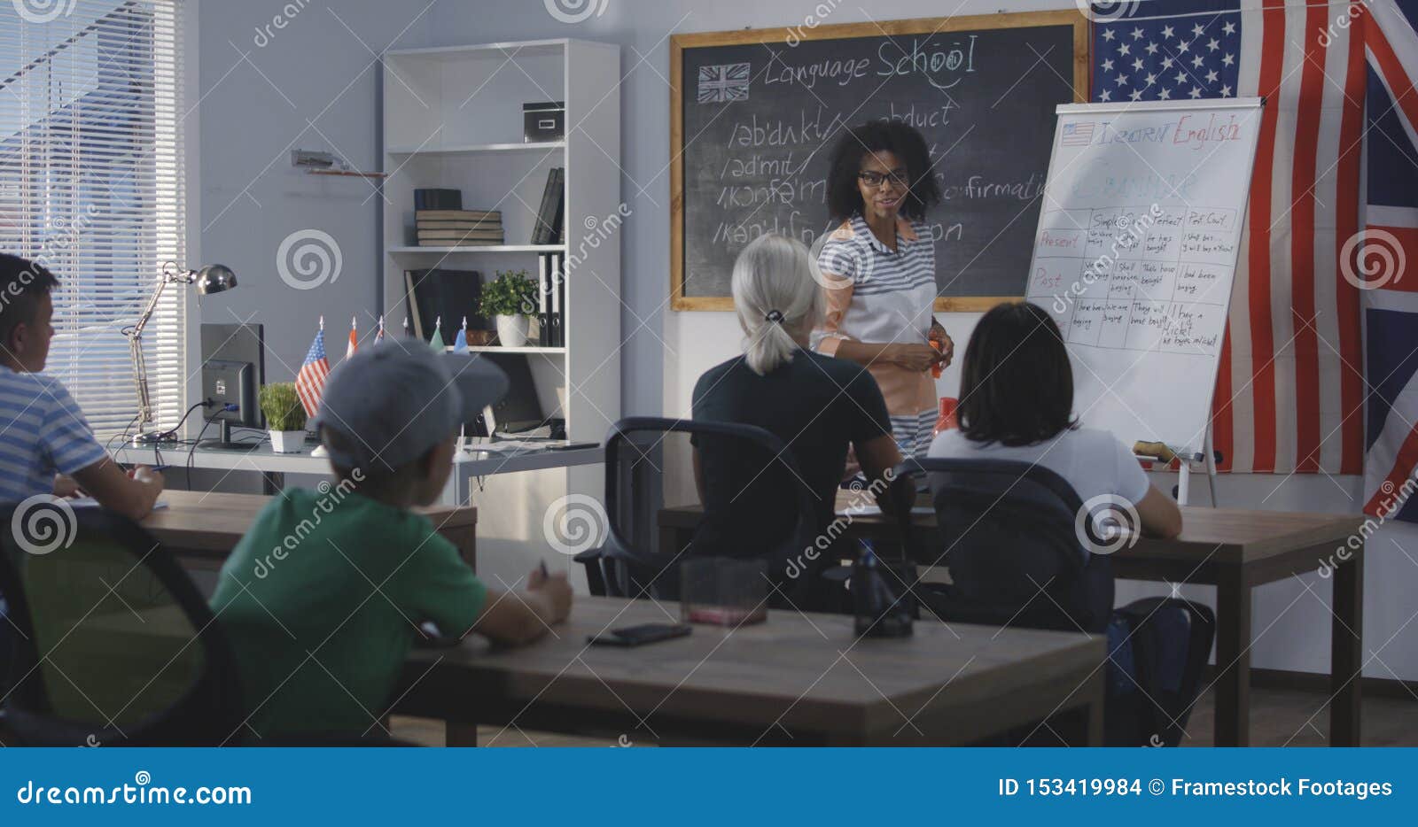 Teacher Using Flip Chart while Explaining To a Class Stock Photo ...
