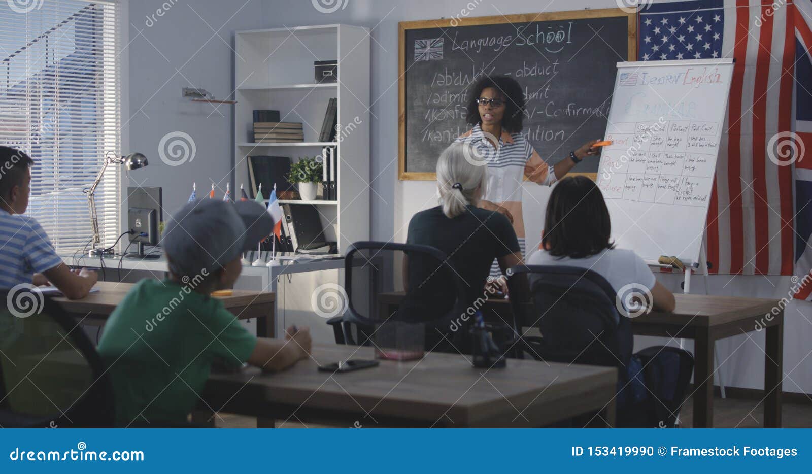 Teacher Using Flip Chart while Explaining To a Class Stock Photo ...