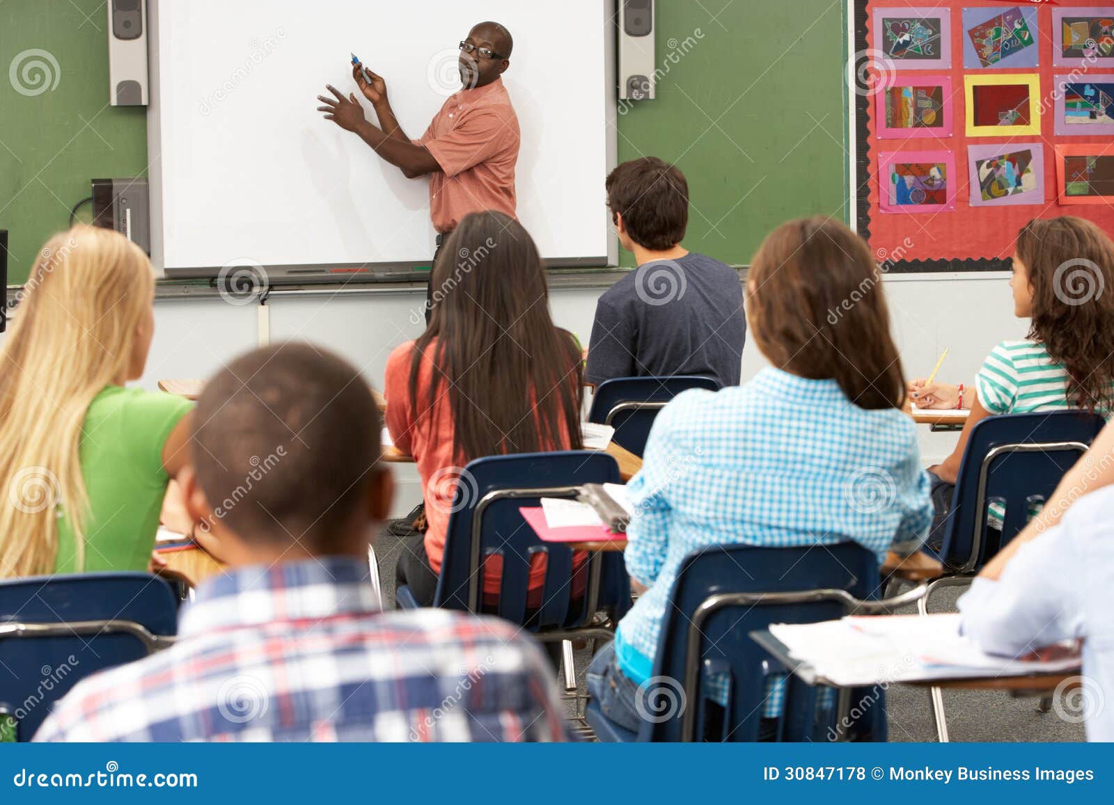 Teacher Using Interactive Whiteboard during Lesson Stock Photo - Image ...