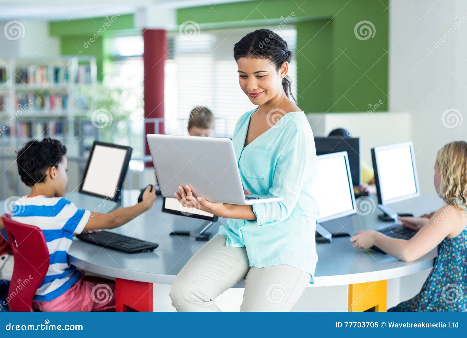 Teacher Using Laptop with Computer Class Stock Image - Image of ...
