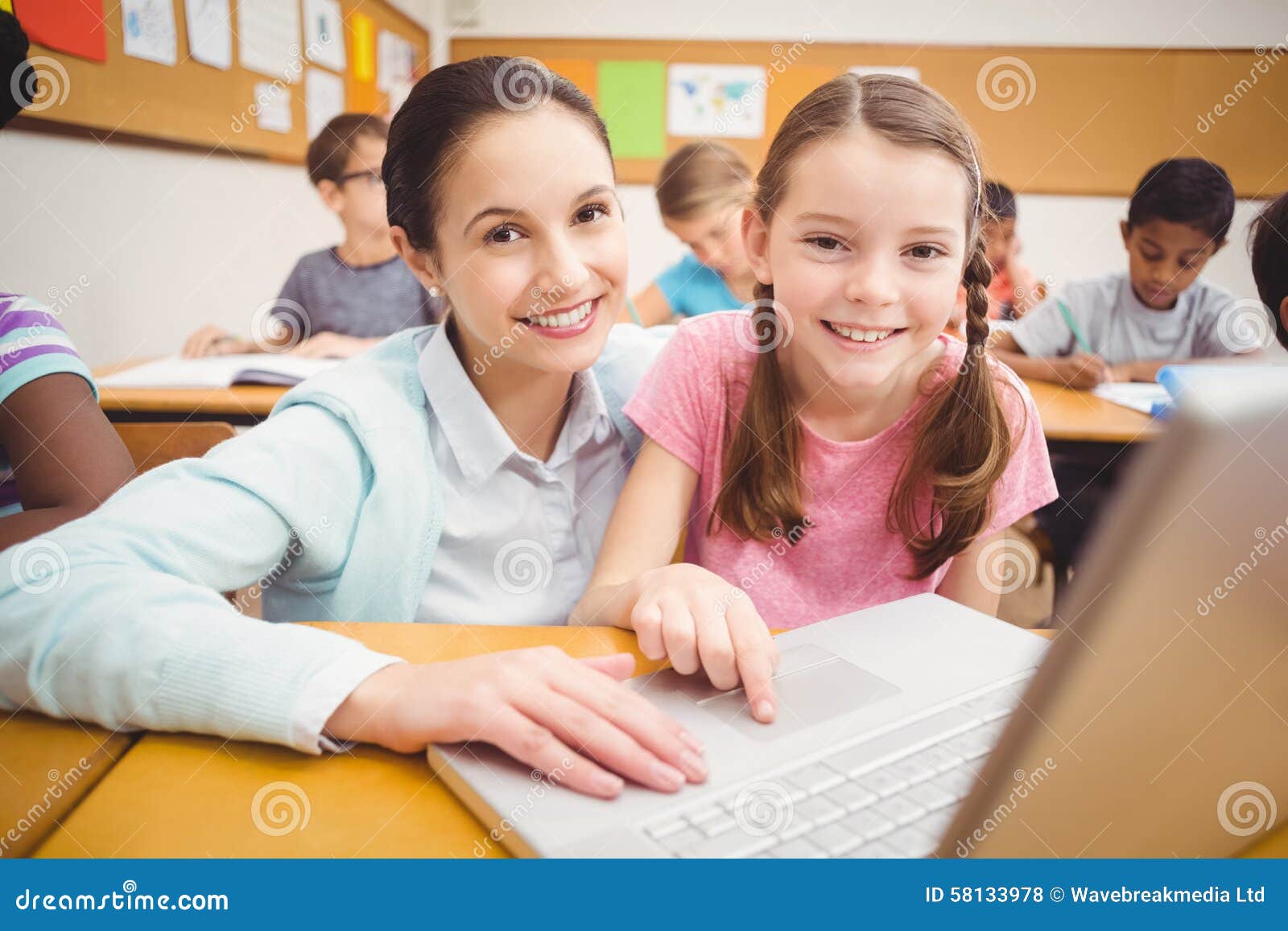 Teacher Using Laptop with Pupil Stock Photo - Image of knowledge ...