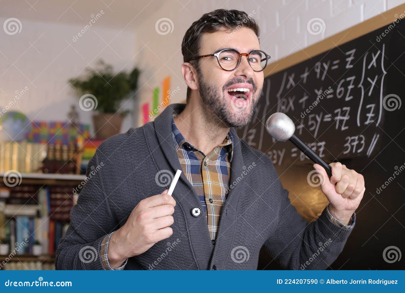 Teacher Using Microphone in Classroom Stock Photo - Image of formula ... Teacher Using Microphone in Classroom Stock Photo - Image of formula ...