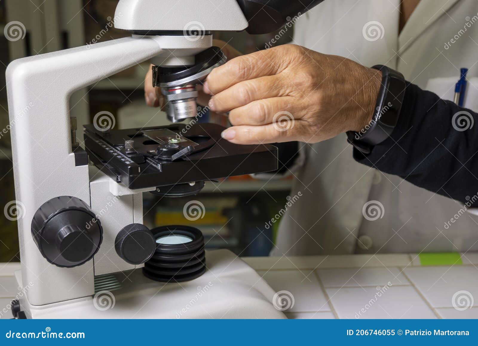 Teacher is Using an Optical Microscope Stock Image - Image of ...