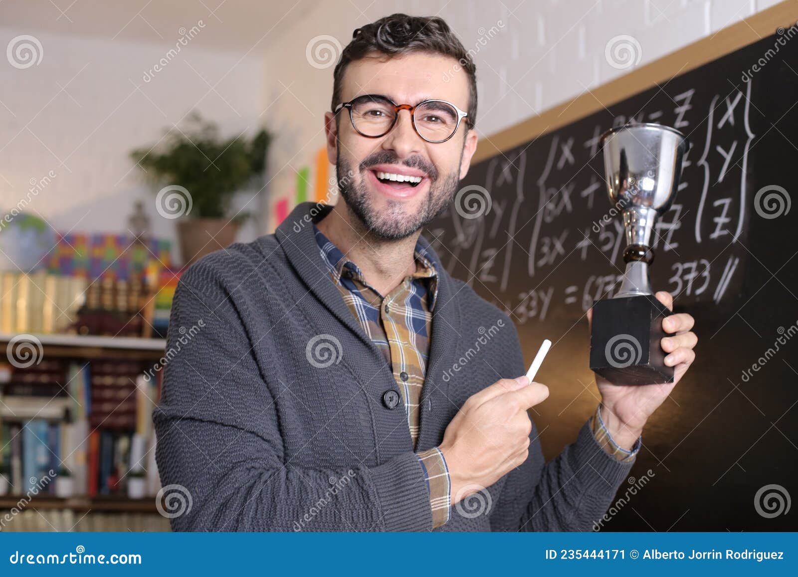 Teacher Winning Silver Trophy in Classroom Stock Image - Image of class ...
