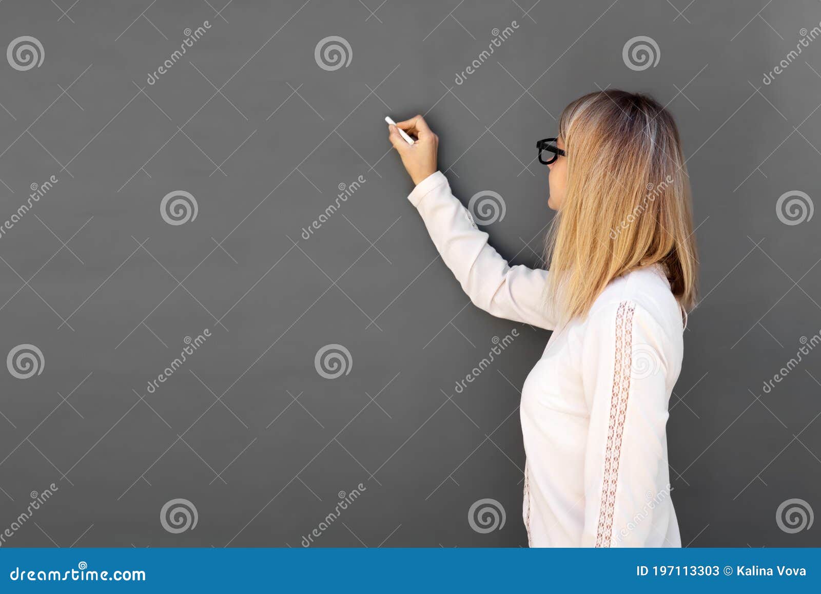 A Teacher Writes on Blackboard at School Stock Image - Image of hair ... A Teacher Writes on Blackboard at School Stock Image - Image of hair ...