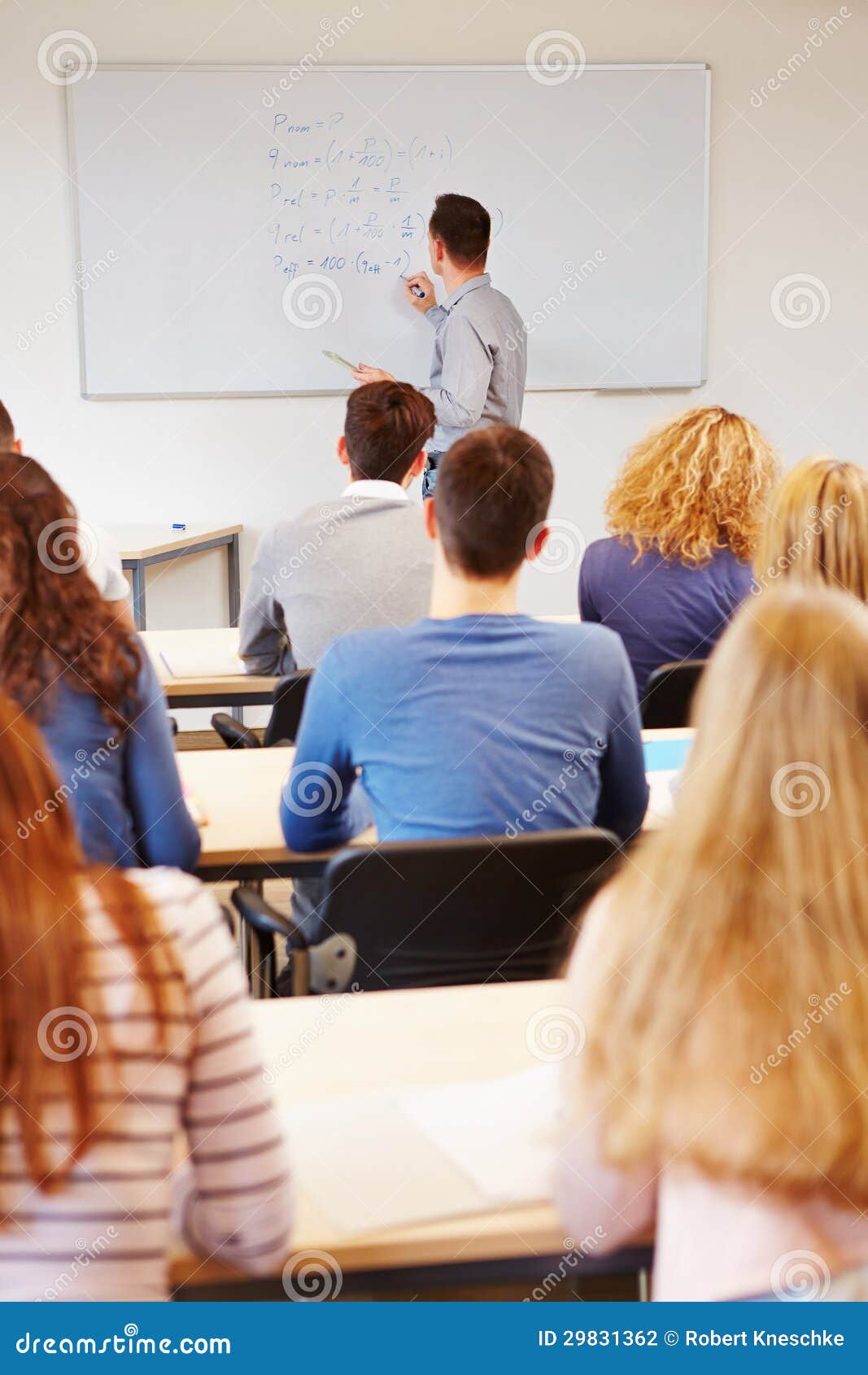 Teacher Writing Formulas on Stock Photo - Image of business, lessons ...