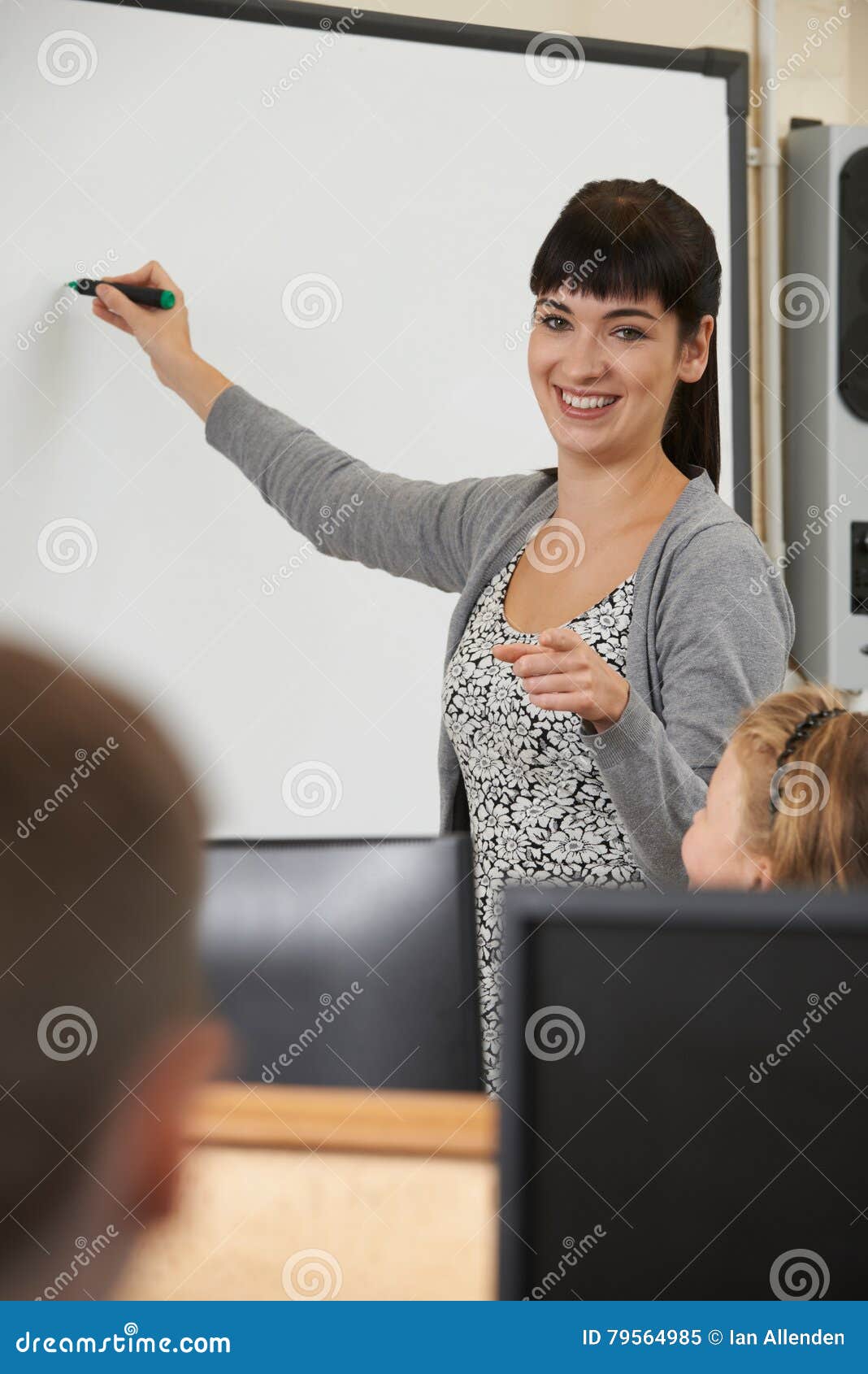Teacher Writing on Interactive Whiteboard in Computer Lesson Stock ...