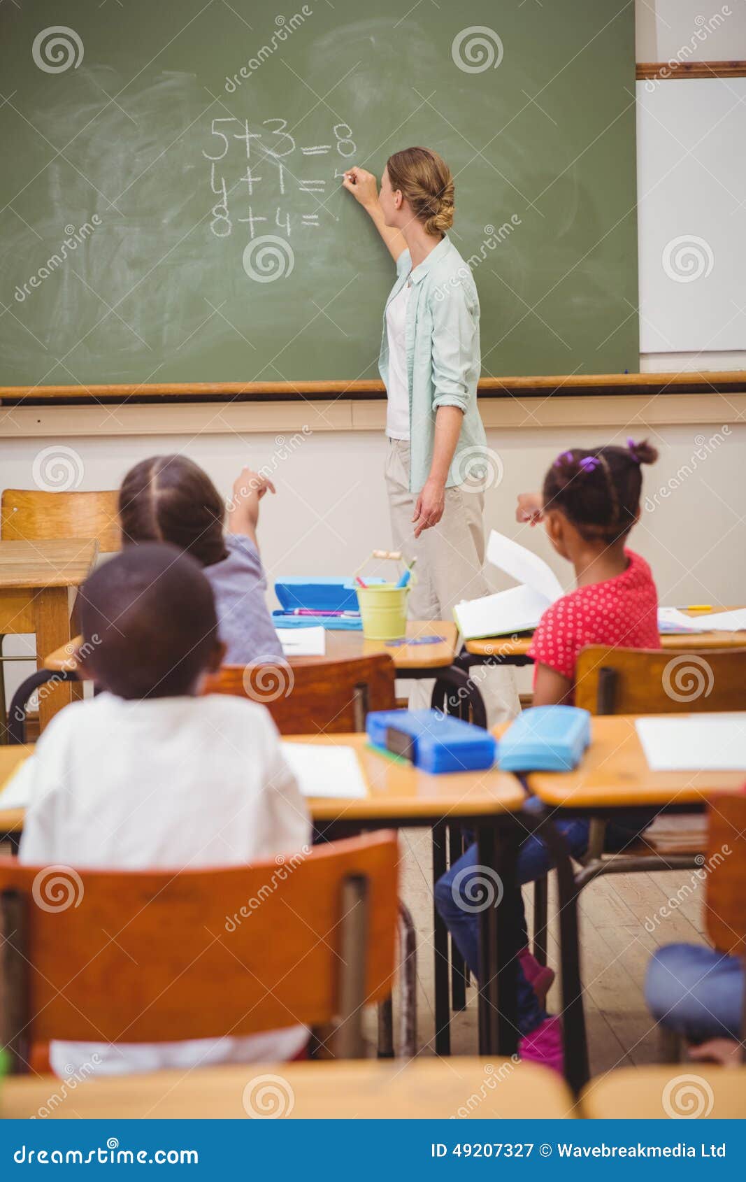 Teacher Writing Mathematics on Board Stock Image - Image of learning ...