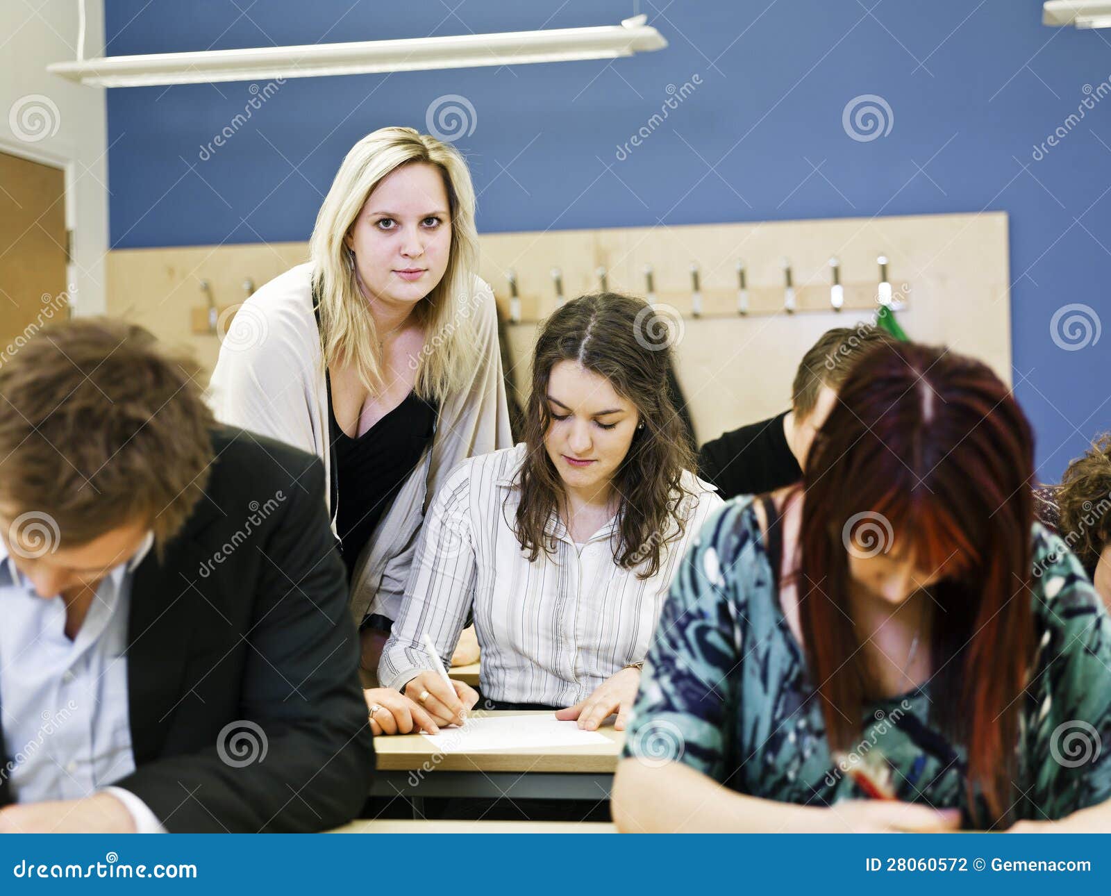 Teacher and young students stock photo. Image of presentation - 28060572