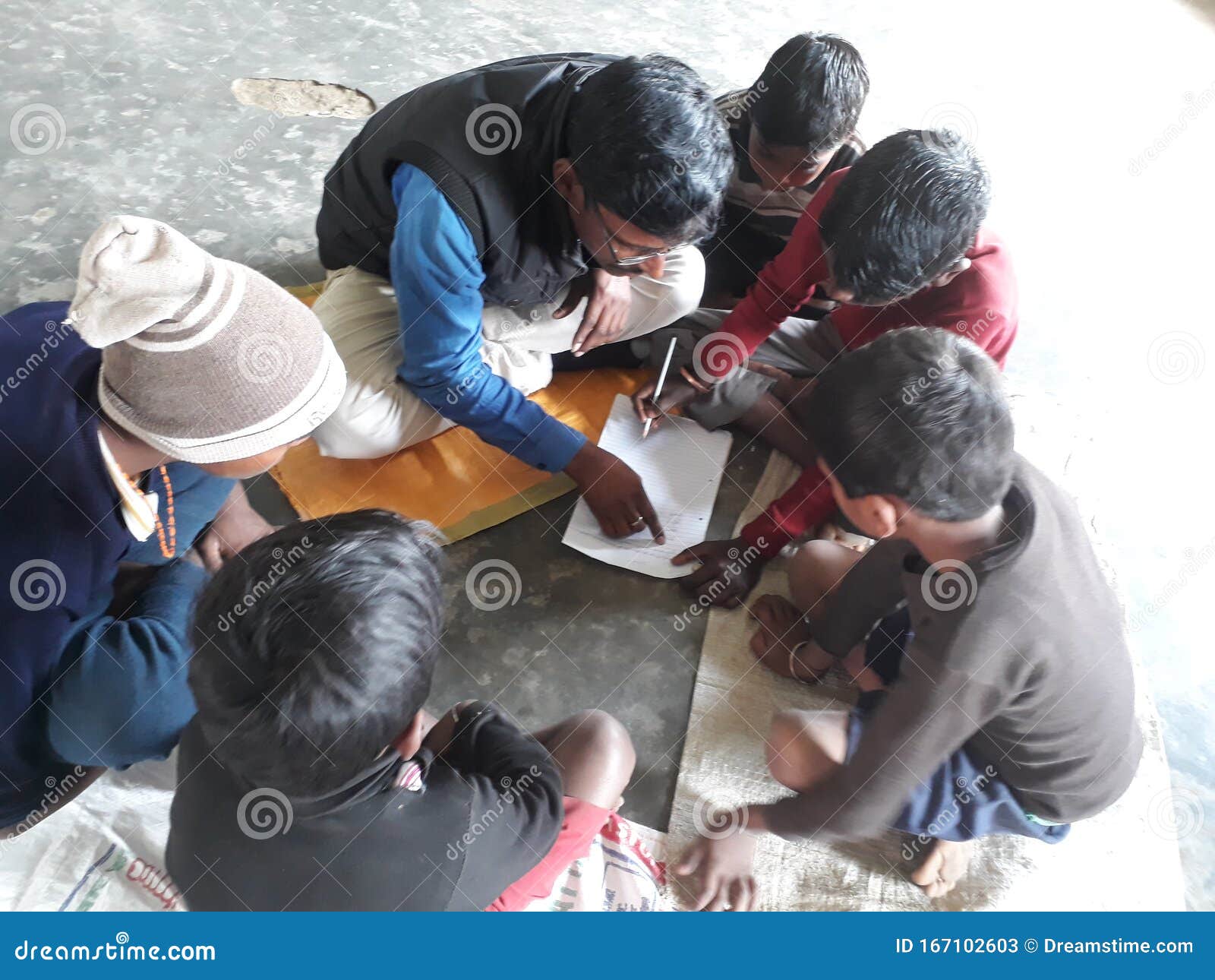 Teachers Helping the Child in a Learner Group Editorial Stock Photo ...