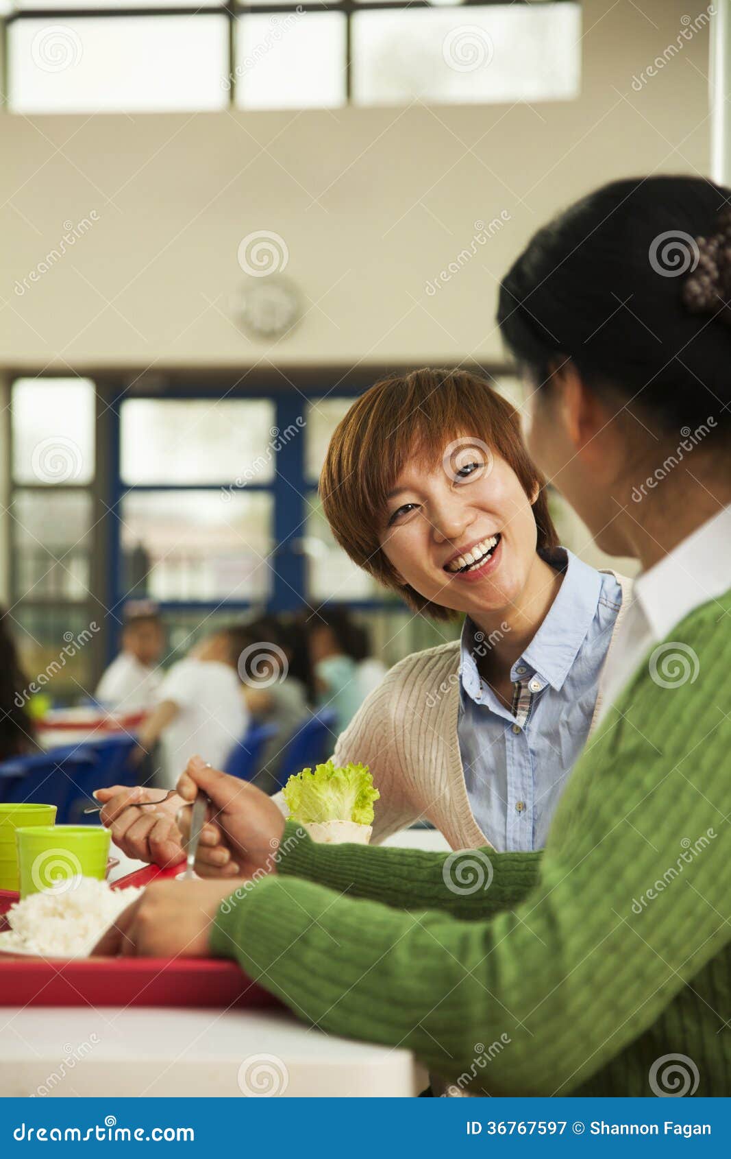 Teachers Talking at Lunch in School Cafeteria Stock Image - Image of ...