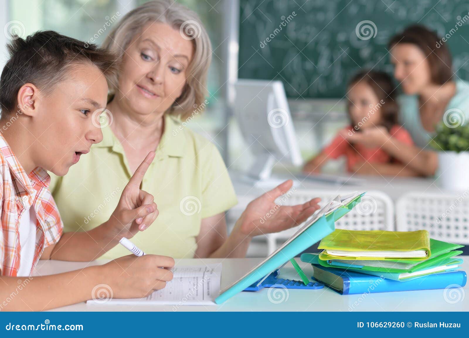 Teachers Working with Pupils Stock Photo - Image of intelligent ...