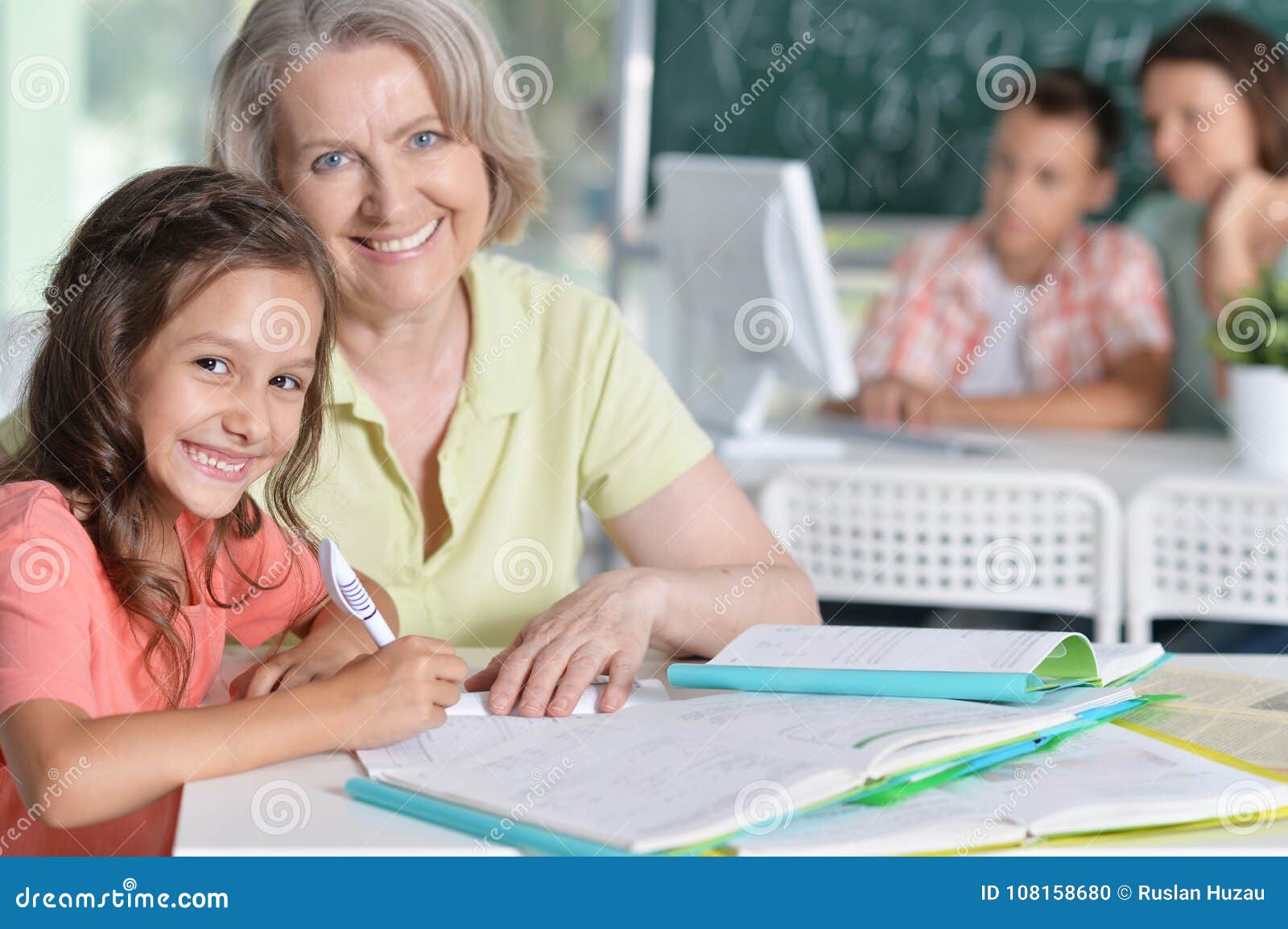 Teachers Working with Pupils Stock Photo - Image of processing ...