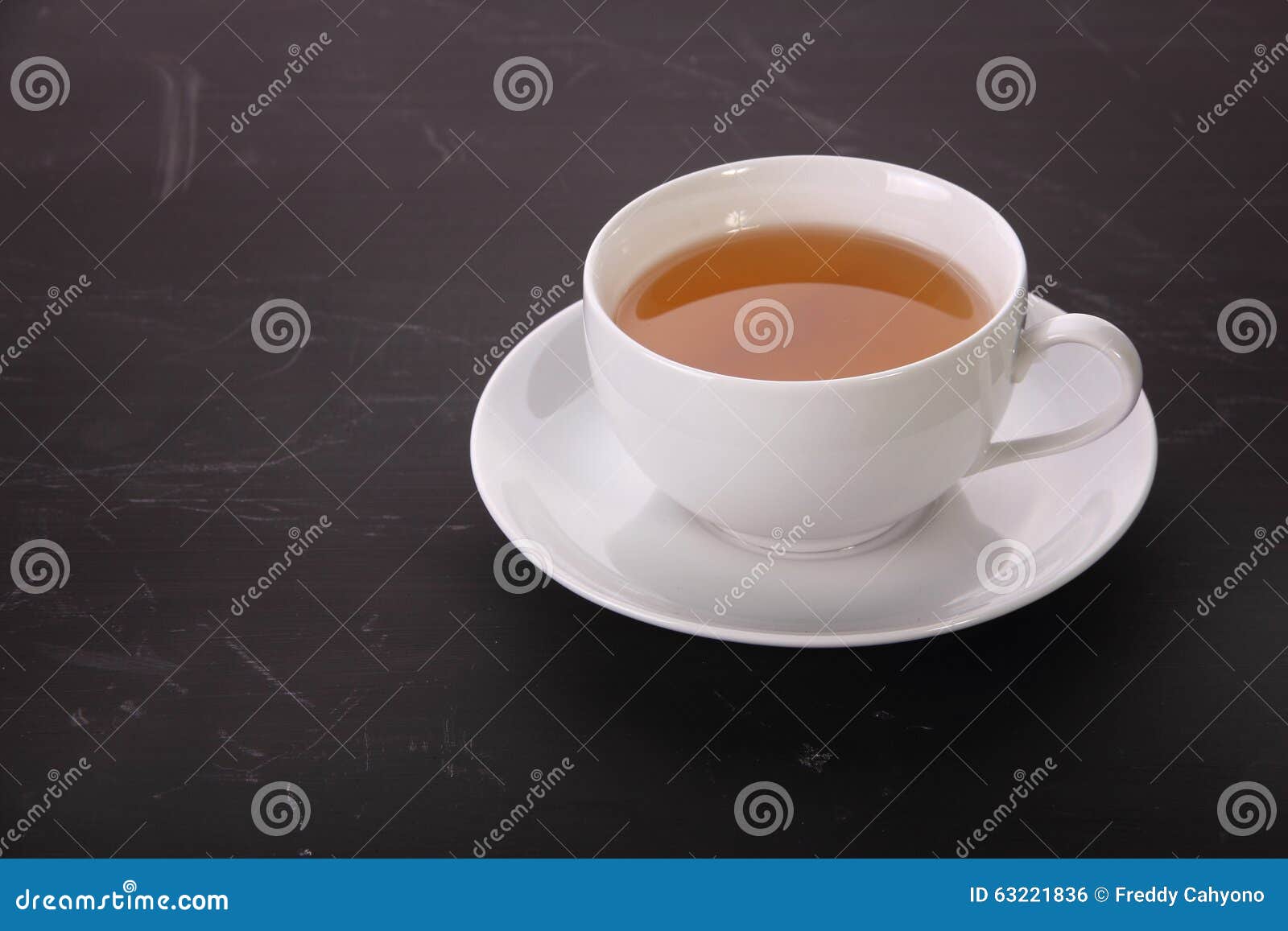 Teacup on table stock photo. Image of elegant, herb, aromatic - 63221836