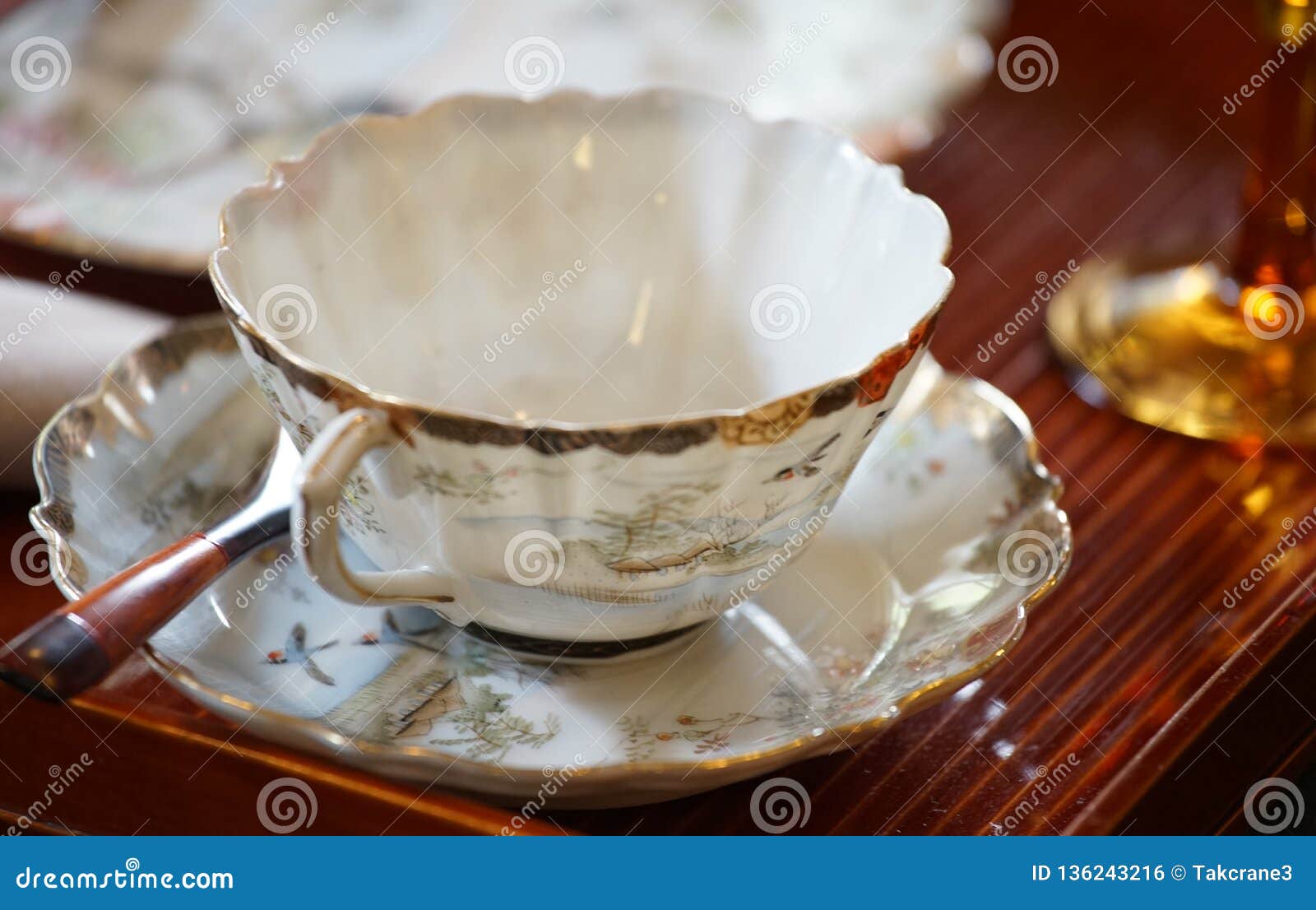 Teacup on the table stock photo. Image of table, scene - 136243216