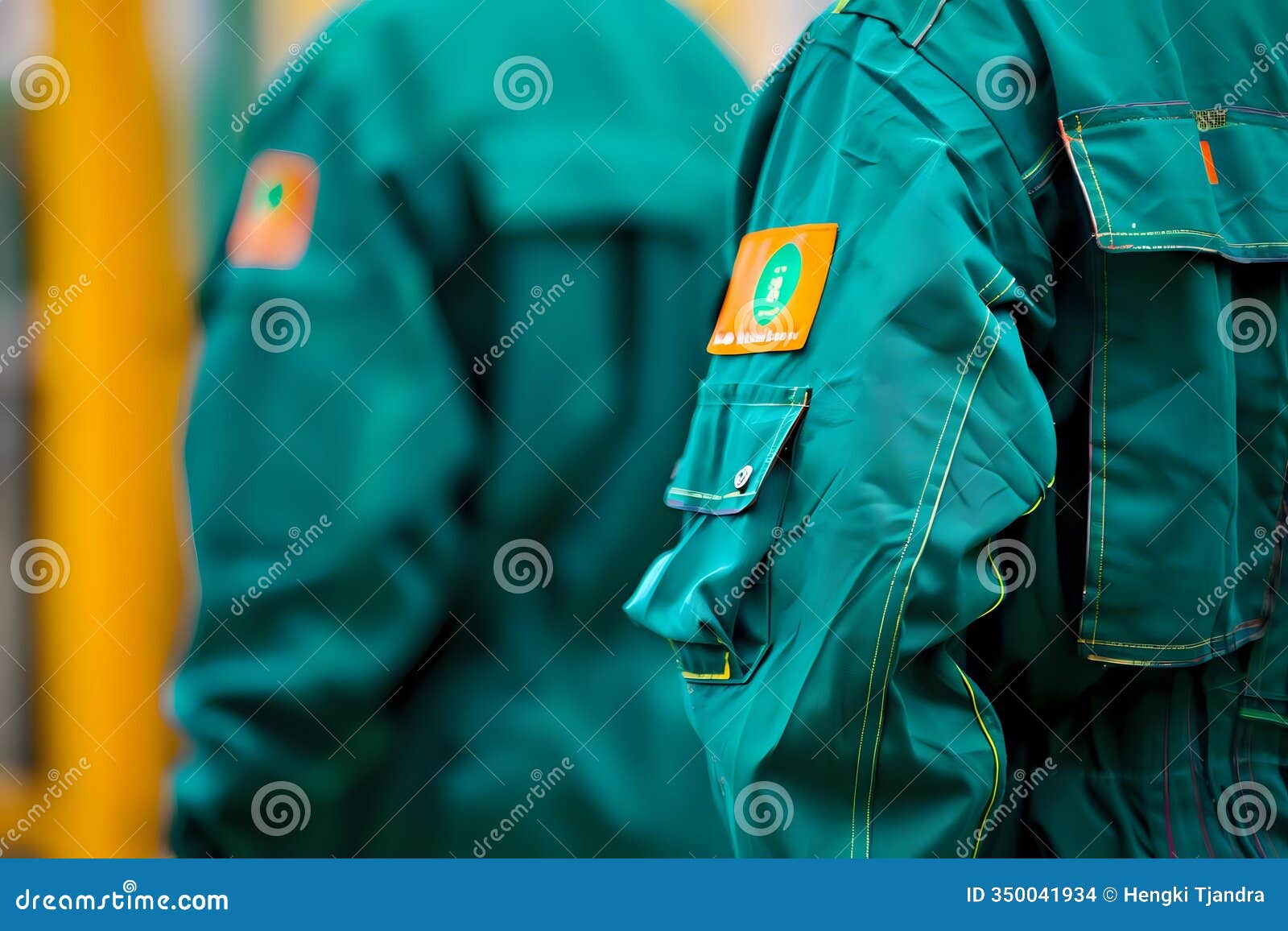 Teal Work Uniforms: Observing the Fabric Texture, Seams, and Pockets of ...