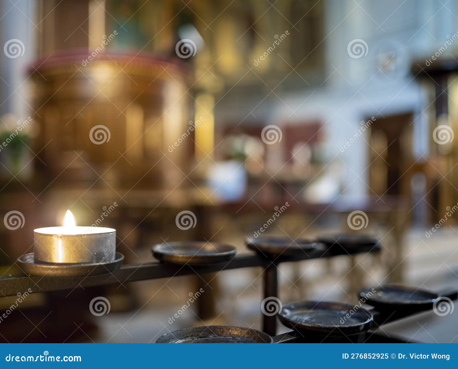 Tealight Candle Burning in Front of a Church Interior Altar Area Stock ...