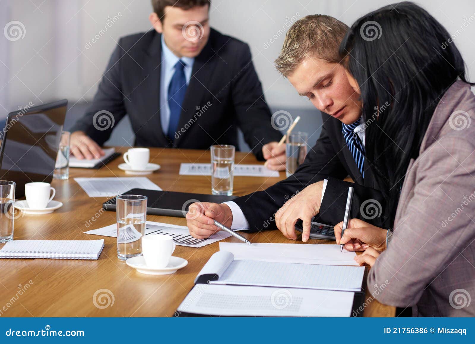 Team of 3 Business People Working on Calculations Stock Photo - Image ...