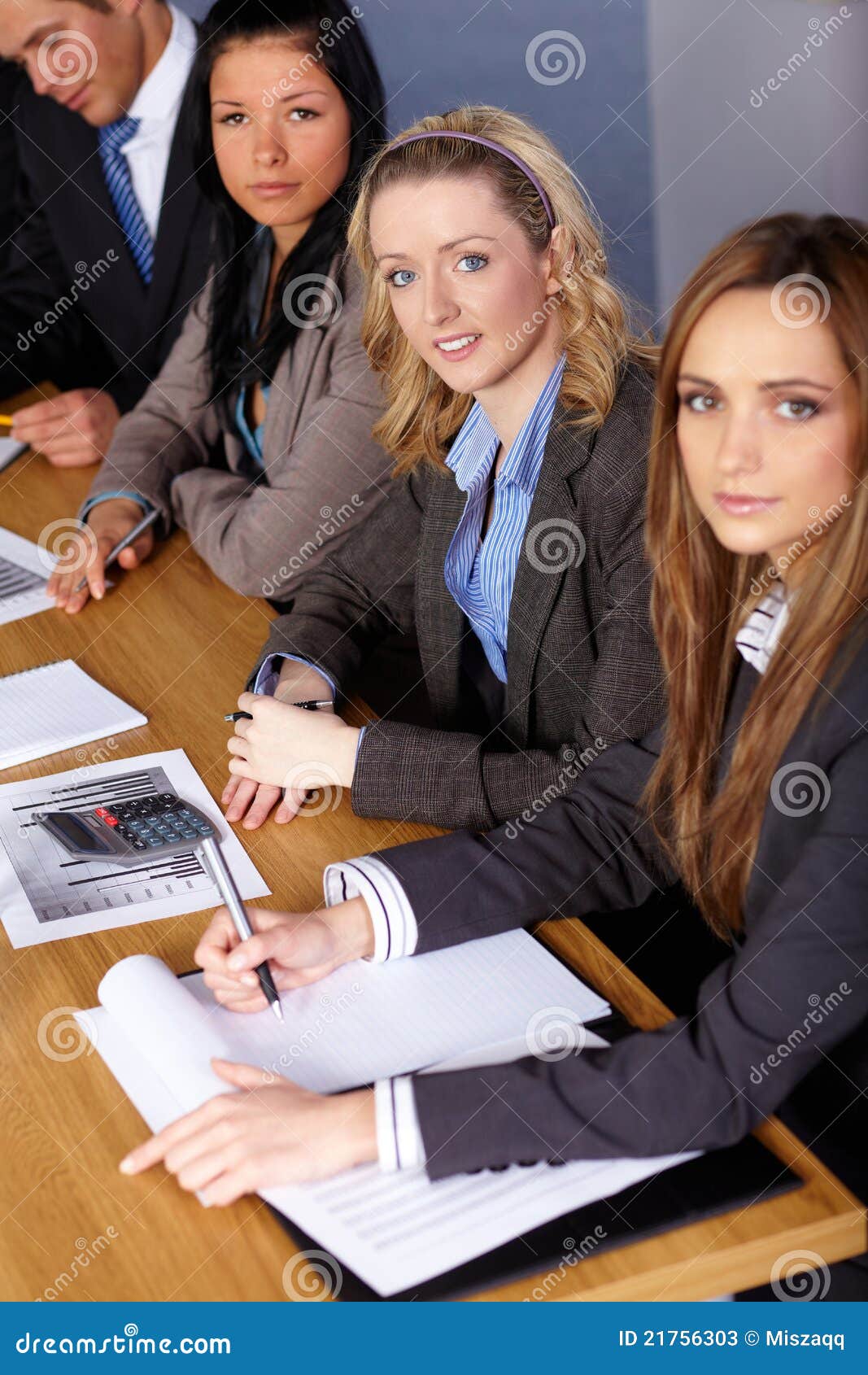 Team of 4 Business People Working on Calculations Stock Image - Image ...