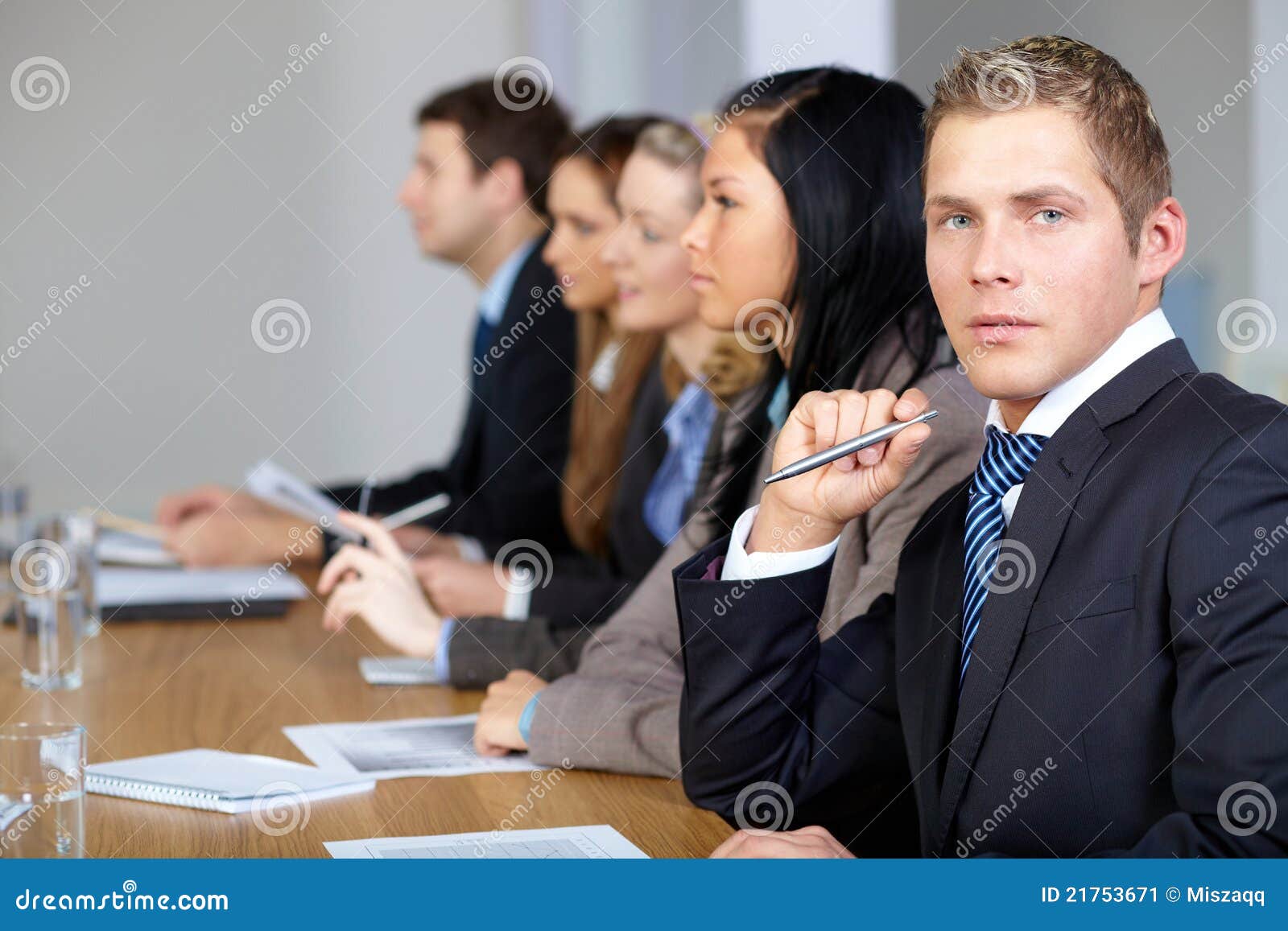 Team of 5 Business People with Young Male at Front Stock Image - Image ...