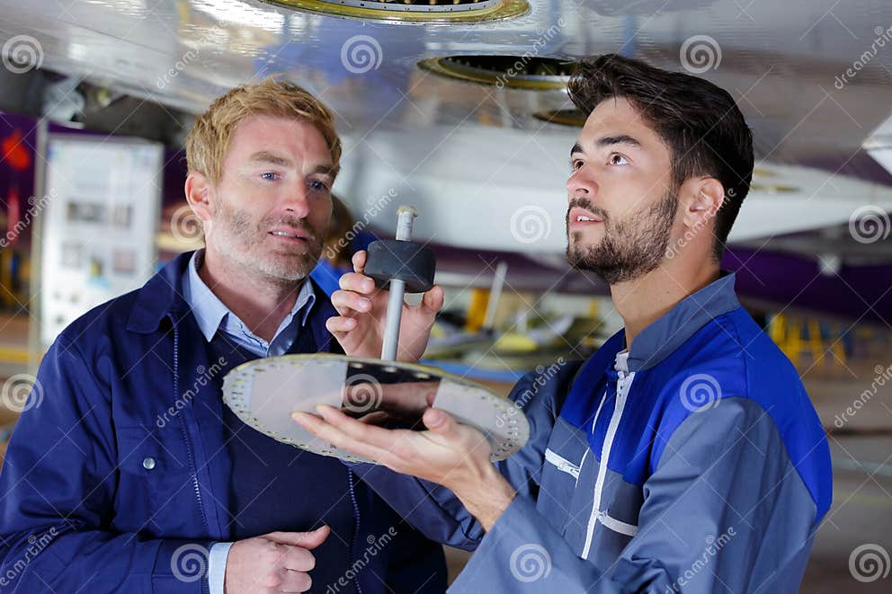 Team aircraft assembler stock photo. Image of apprentice - 301301434
