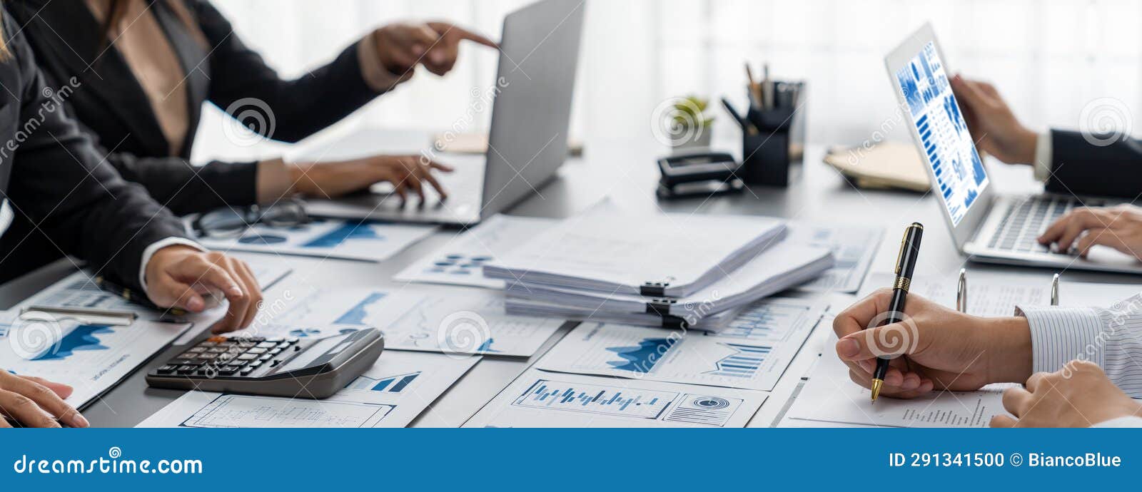 Team of Analyst Working on Financial Data Analysis Dashboard on Paper ...