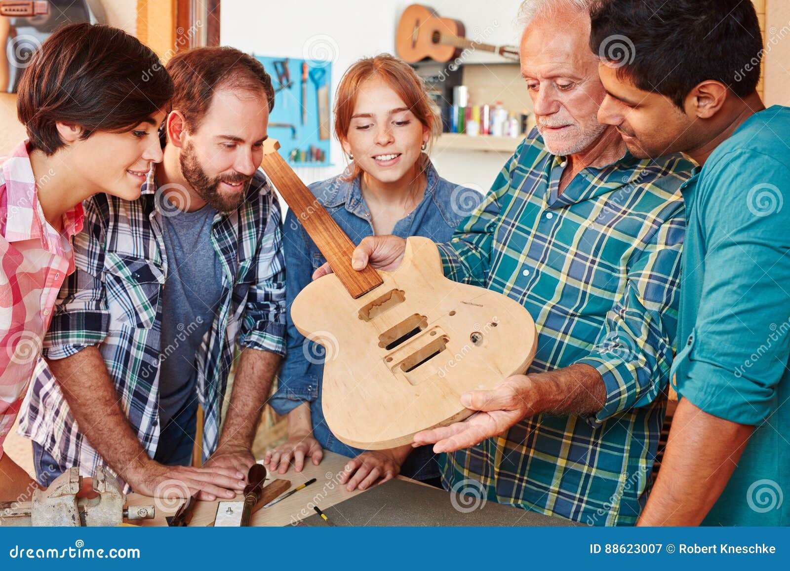 Team of Apprentice and Luthier Stock Image - Image of production, group: 88623007
