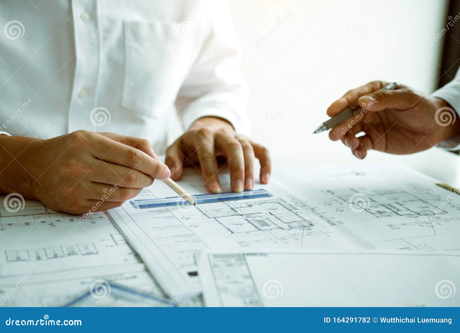 Team Architect or Engineering People Discussion Working on Table ...