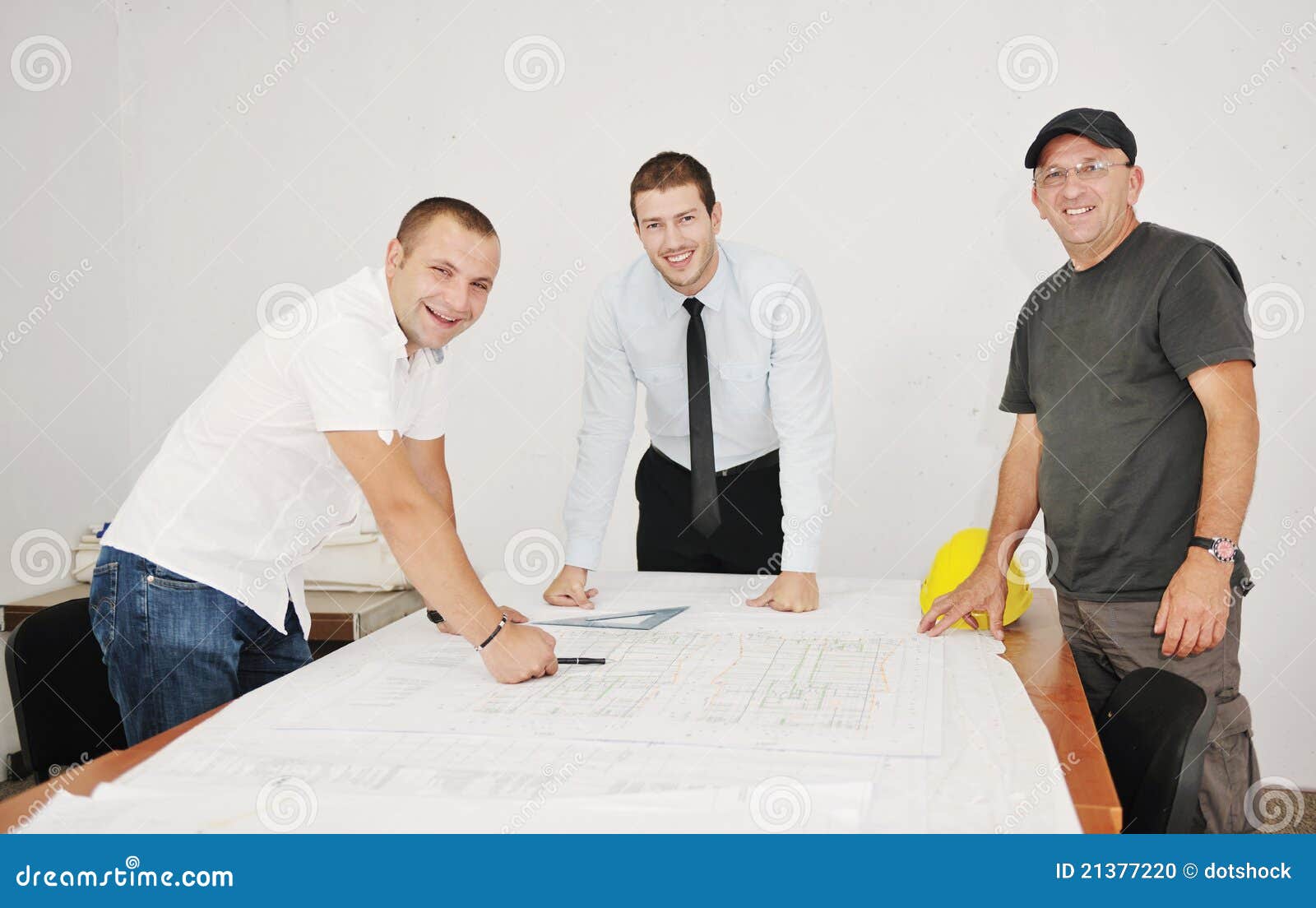 Team of Architects on Construciton Site Stock Photo - Image of ...