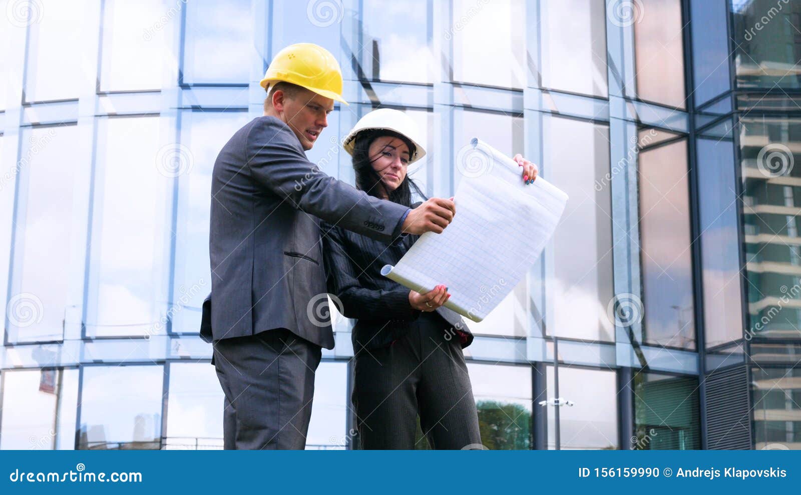 Team of Architects and Engineer in Group on Construciton Site Check ...