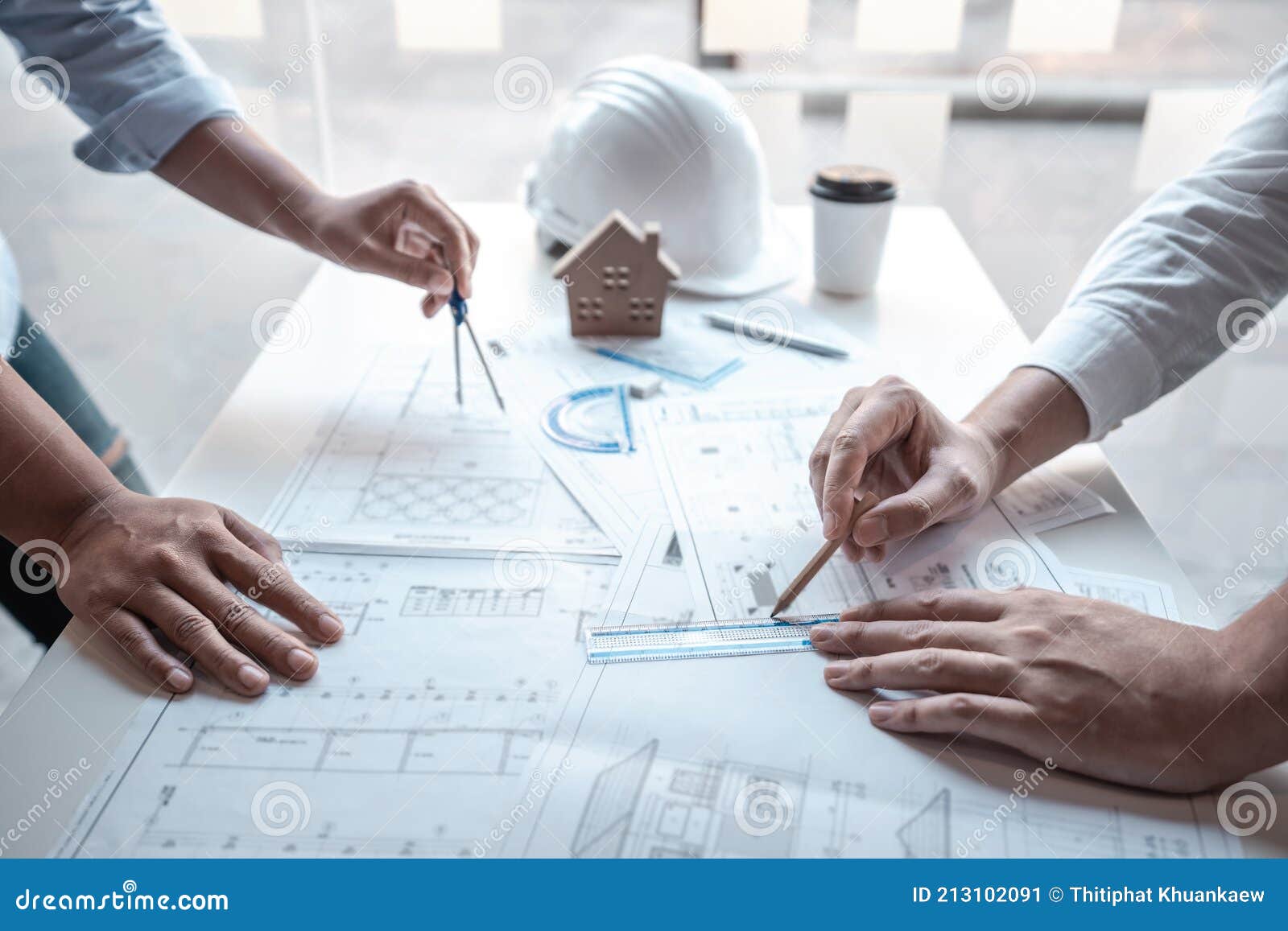 Team of Architects or Engineering Consulting and Analyzing Working on ...