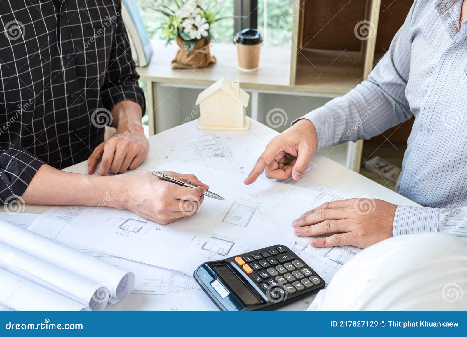 Team of Architects or Engineering Consulting and Analyzing Working on ...