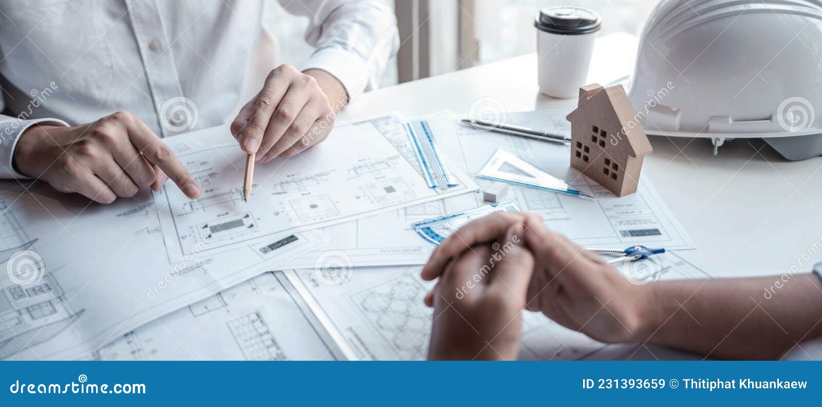 Team of Architects or Engineering Consulting and Analyzing Working on ...