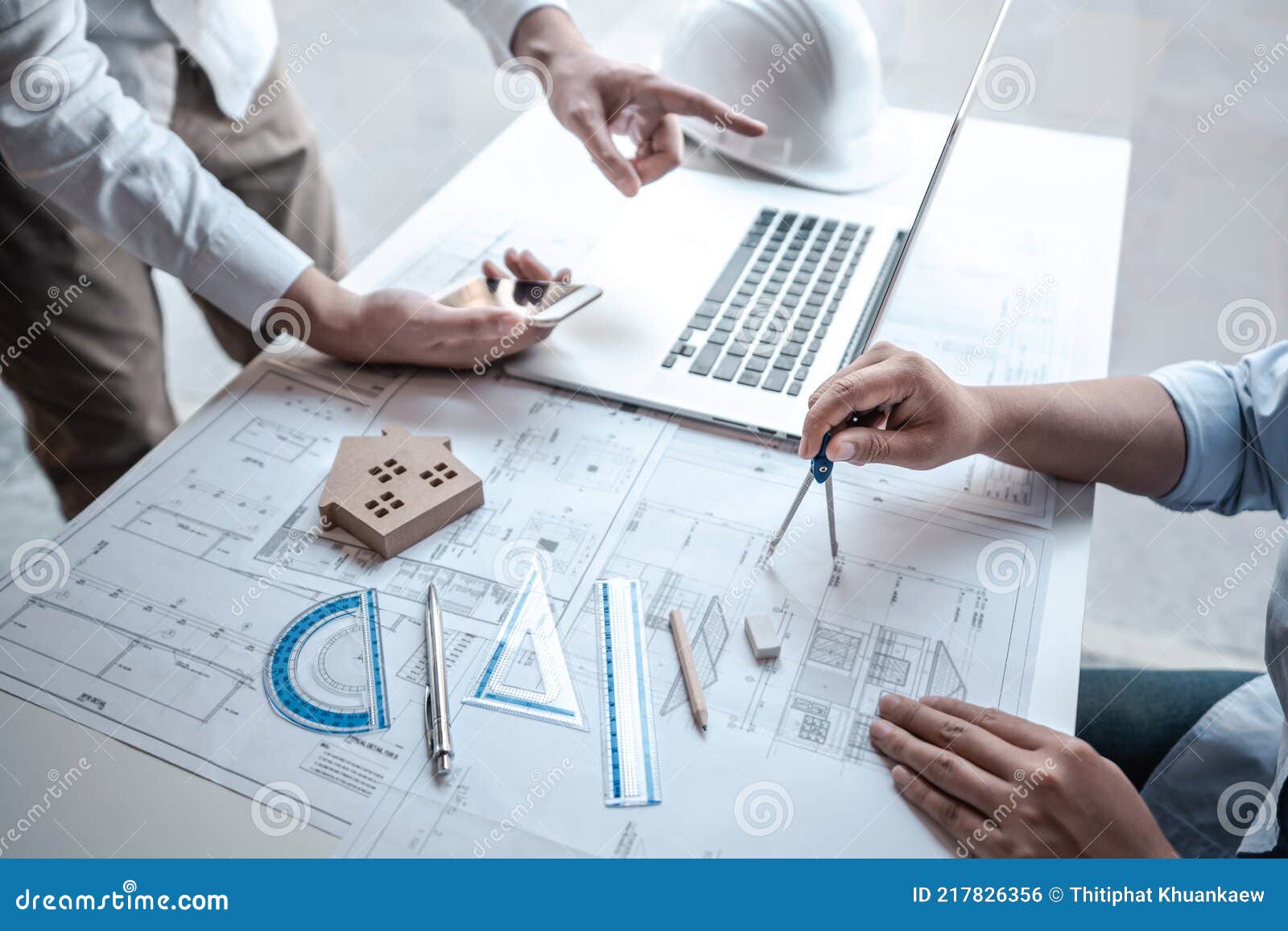 Team of Architects or Engineering Consulting and Analyzing Working on ...