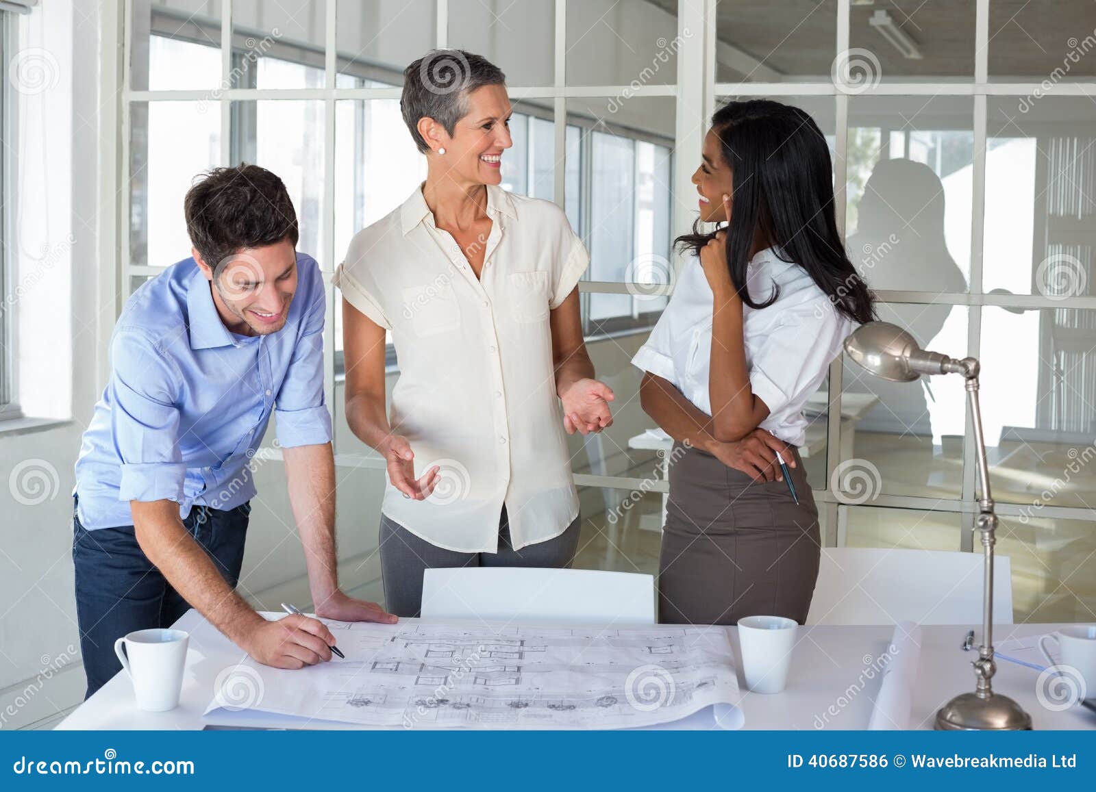Team of Architects Having a Conversation Stock Photo - Image of ...