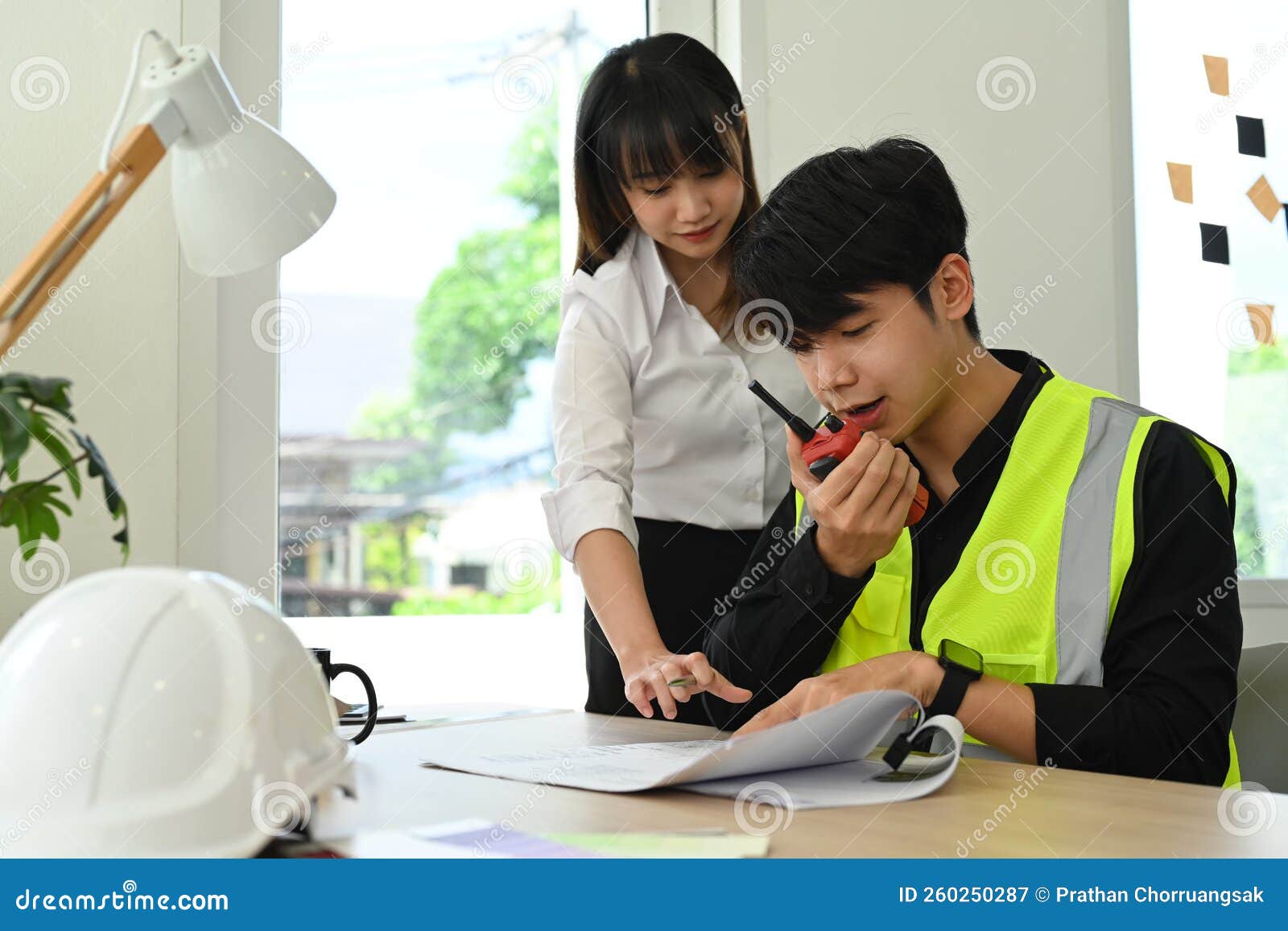 Team of Architects and Inspectors Supervising Progress of Construction ...