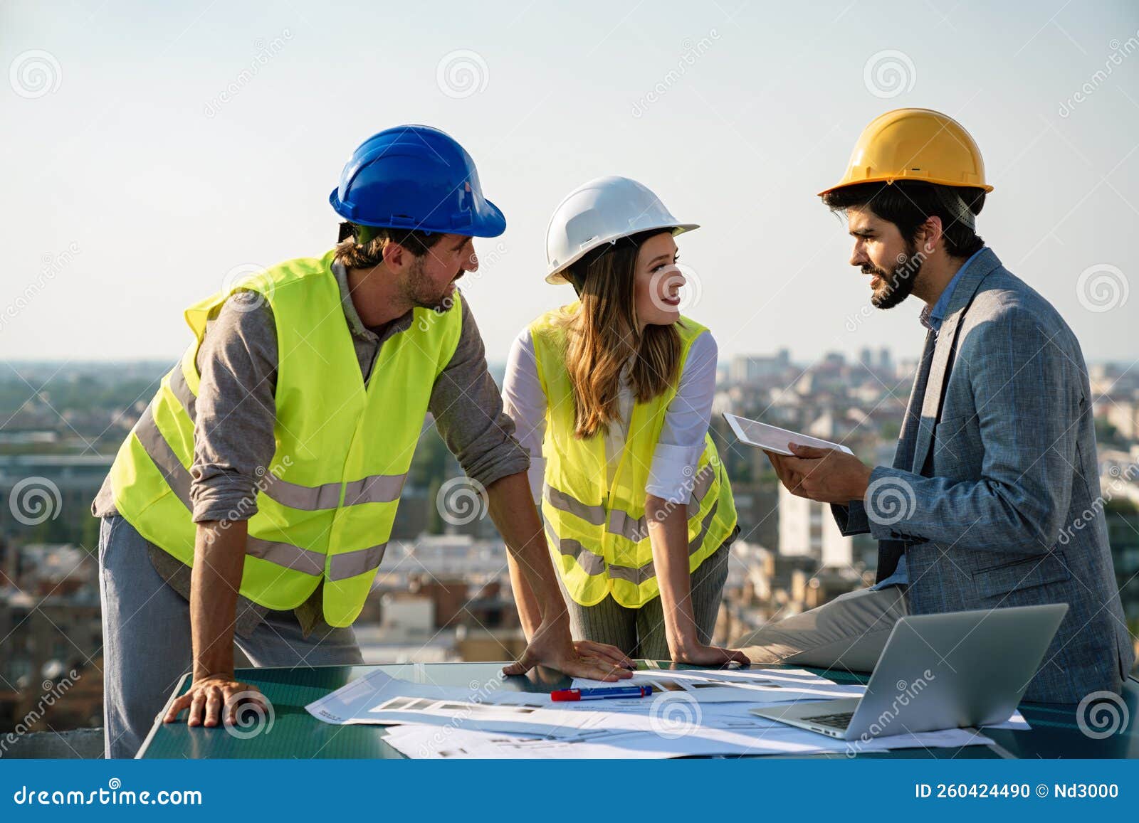 Team of Architects People in Group on Construciton Site Check Documents ...