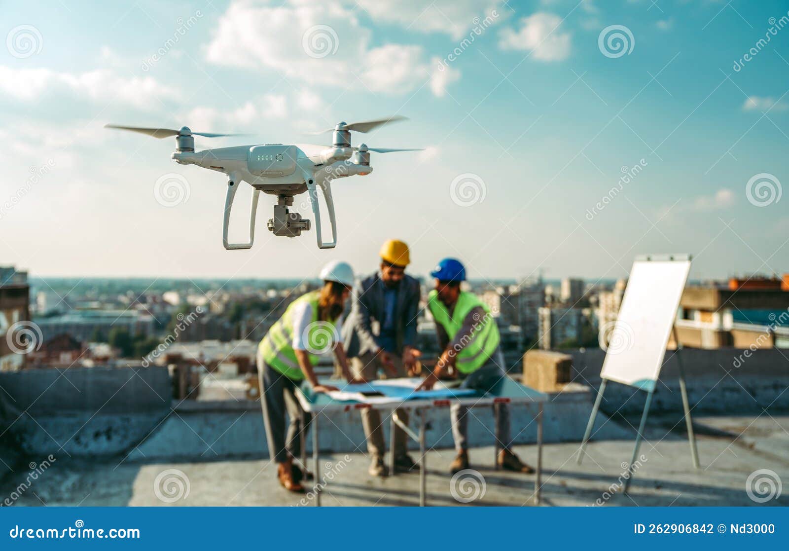 Team of Architects People in Group on Construciton Site Check Documents ...