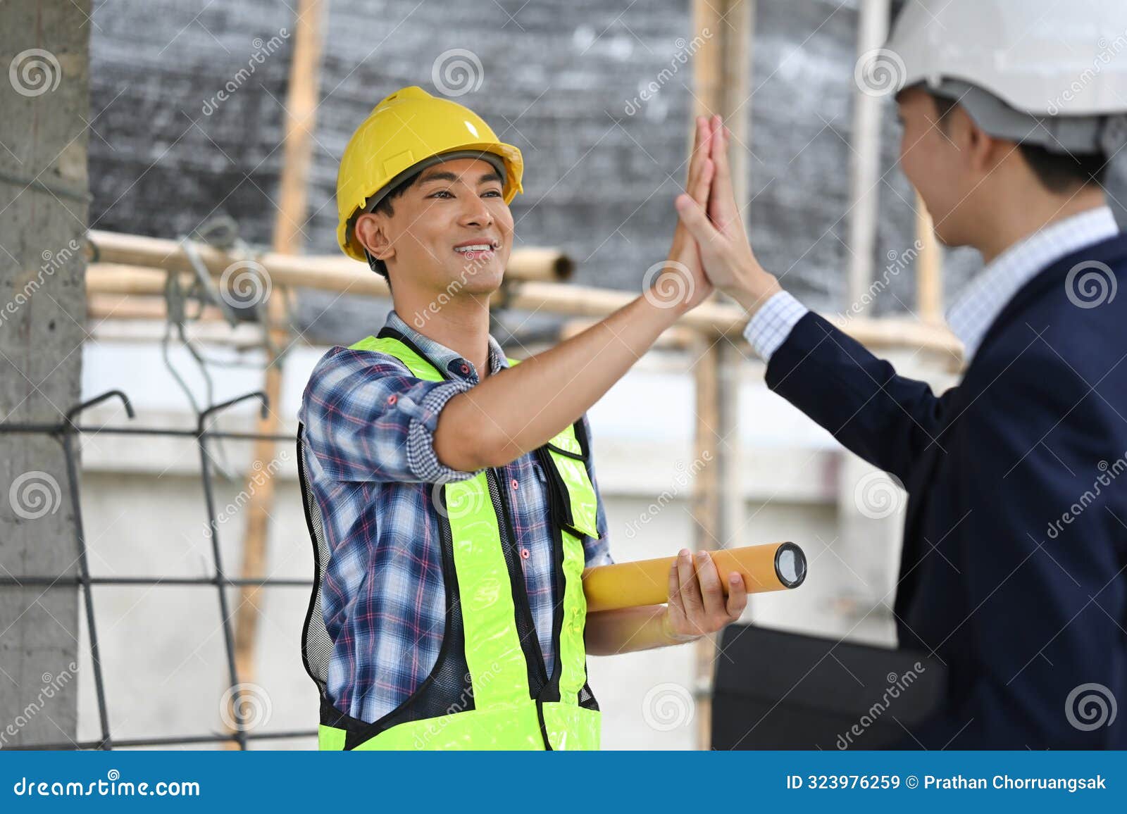 Team of Architects or Structural Engineers Giving High Five and ...