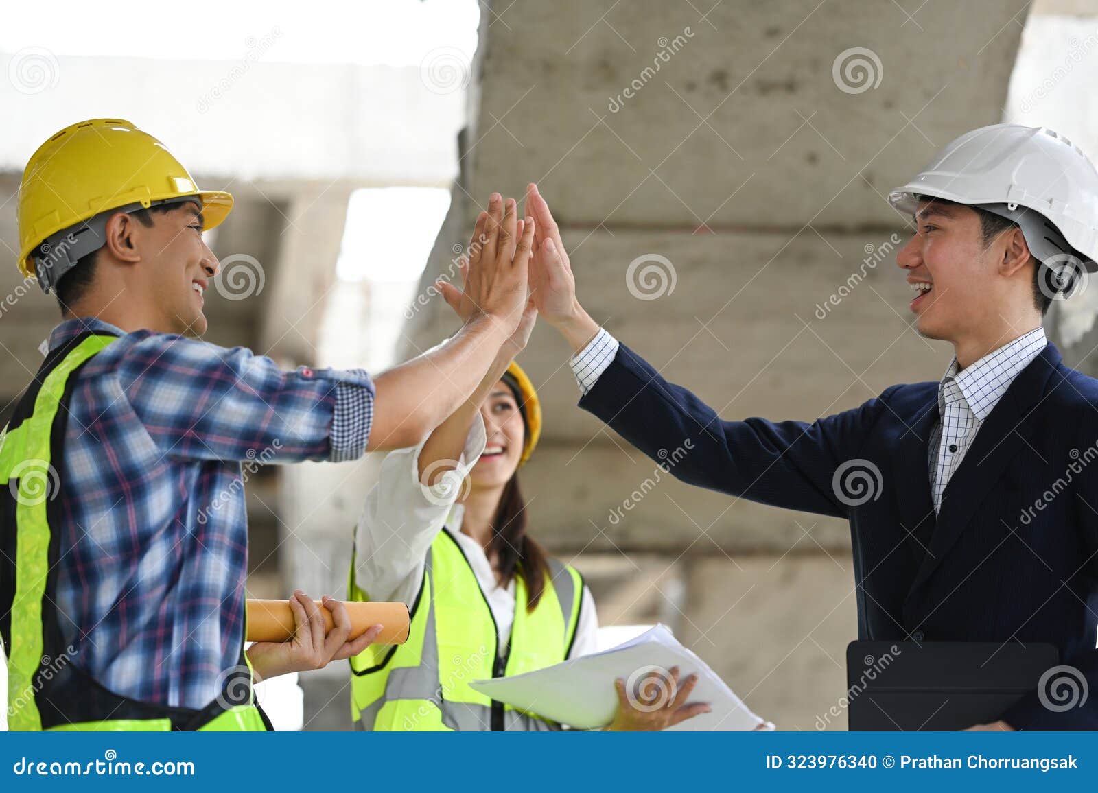 Team of Architects or Structural Engineers Giving High Five and ...
