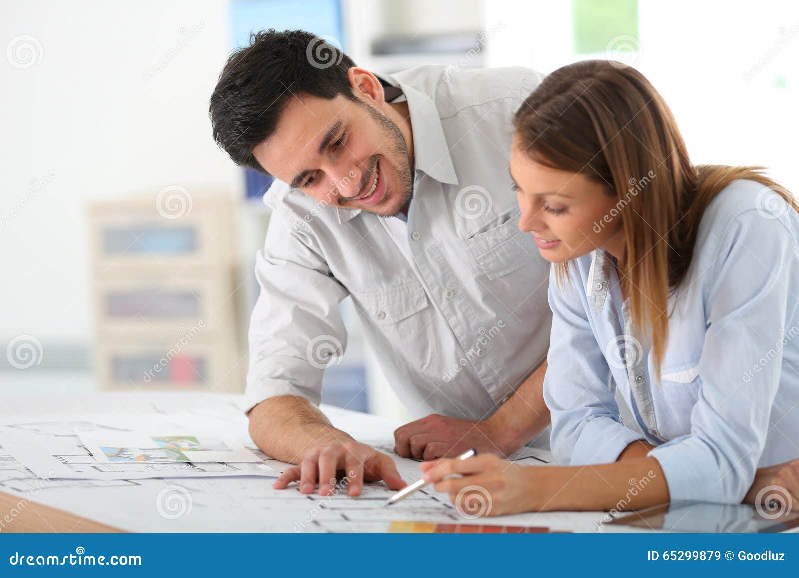 Team of Architects Working on Construction Plan Stock Image - Image of ...