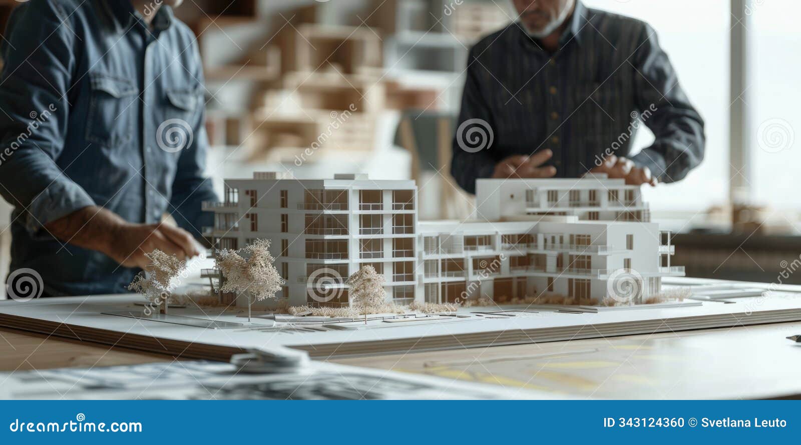 A Team of Architects is Working on a Layout of a Modern Residential ...