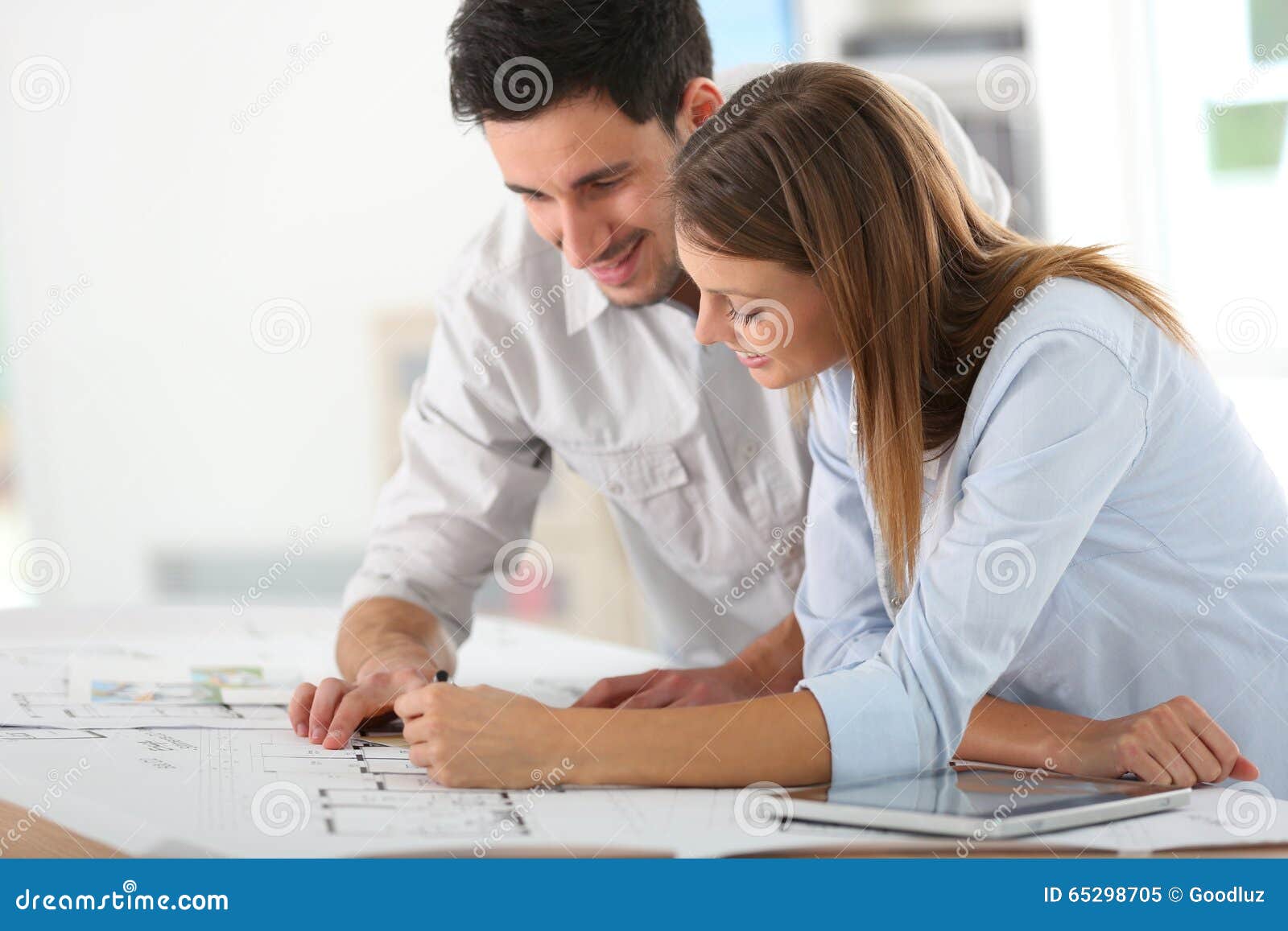 Architects Working On Blueprint, Real Estate Project. Architect ...