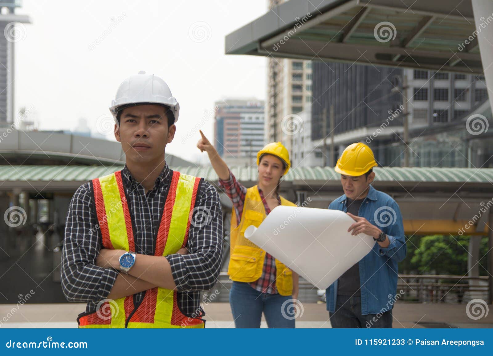 Team of Architectures Standing at Construction Site Looking at P Stock ...