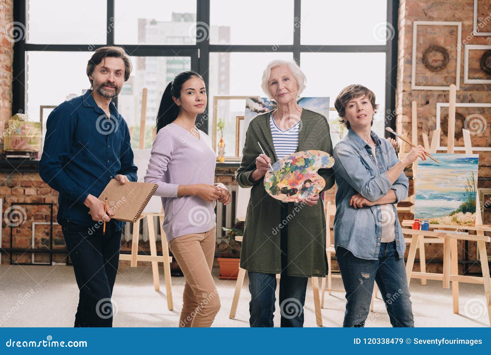 Team of Artists Posing in Studio Stock Image - Image of studio ...